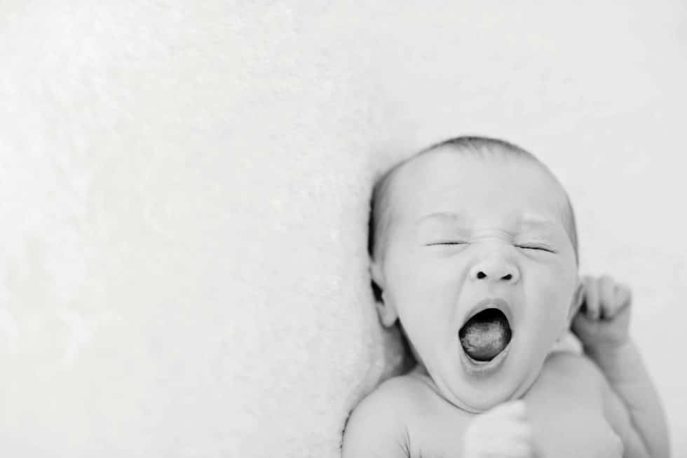 How to Pose a Baby From One of Dallas' Best Newborn Photographers